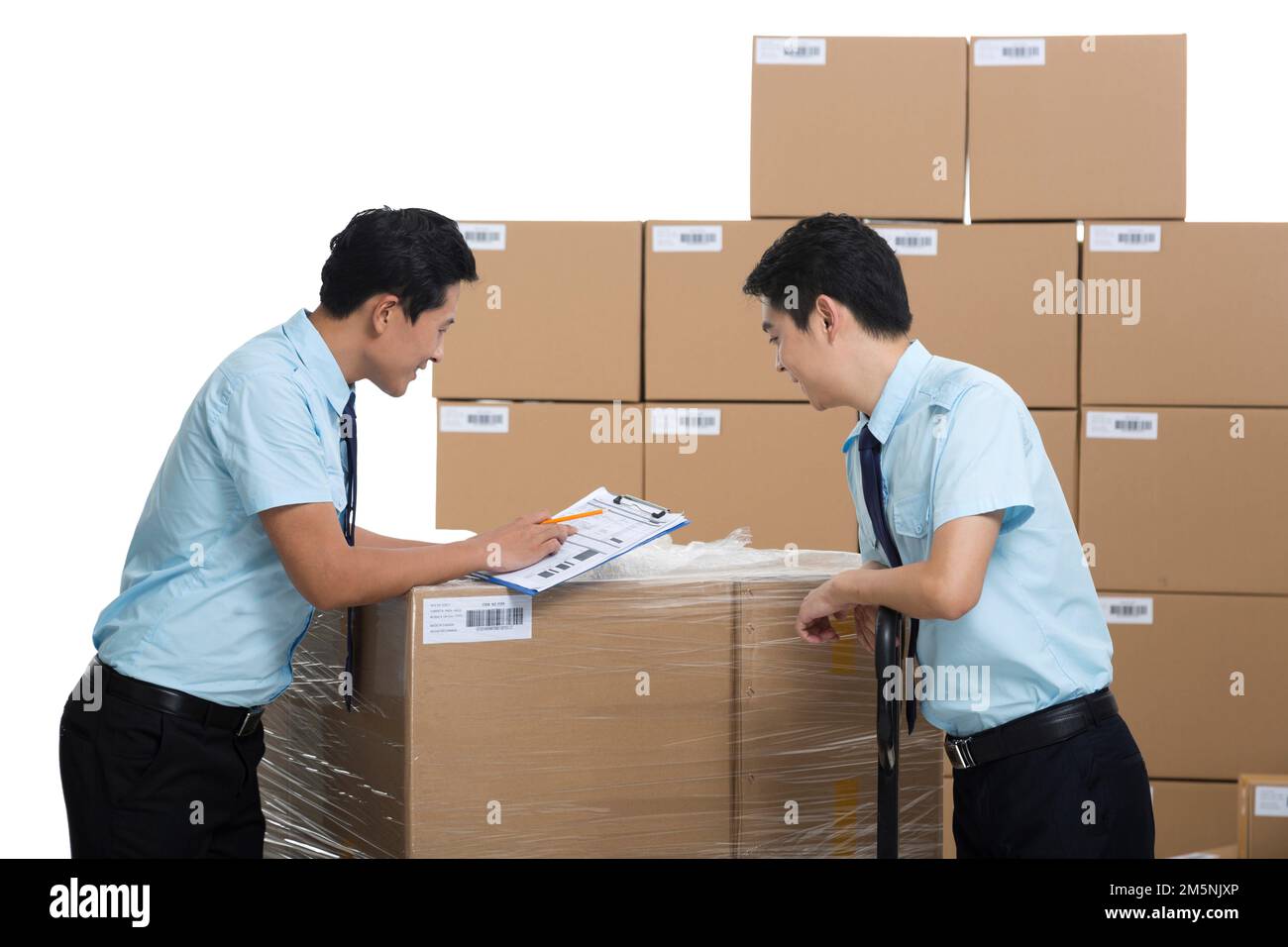 Logistics warehouse personnel in the inspection of goods Stock Photo ...