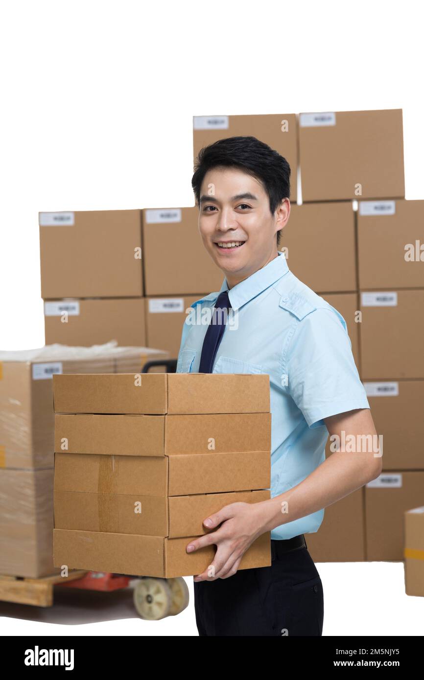 Logistics warehouse staff holding the carton Stock Photo - Alamy