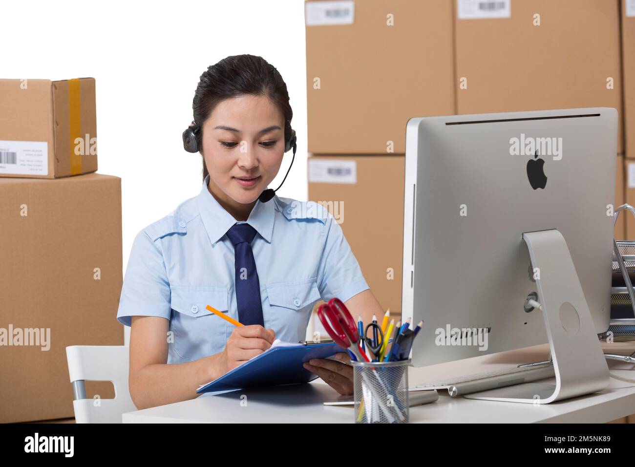 Logistics warehouse customer service staff Stock Photo - Alamy