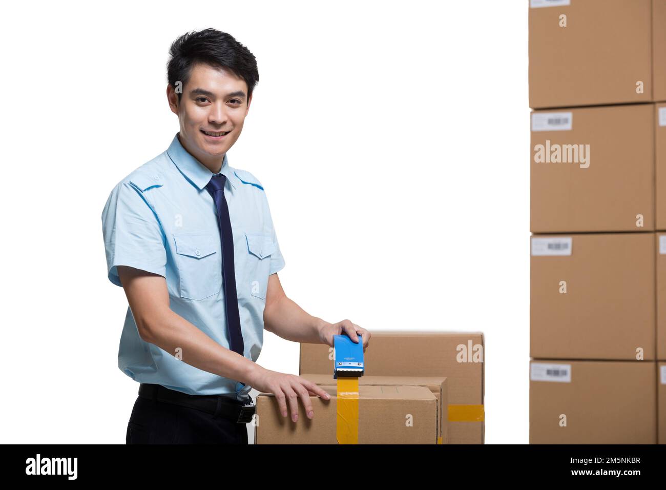 Packaged goods logistics warehouse staff Stock Photo - Alamy