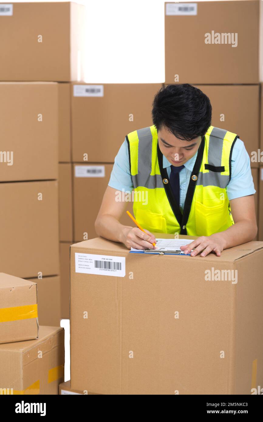 Logistics warehouse staff to check the goods Stock Photo - Alamy