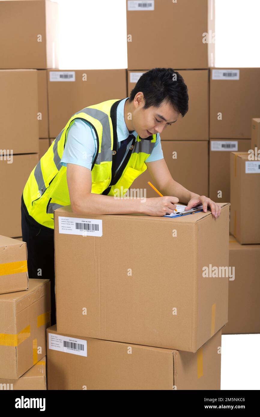 Logistics warehouse staff to check the goods Stock Photo - Alamy