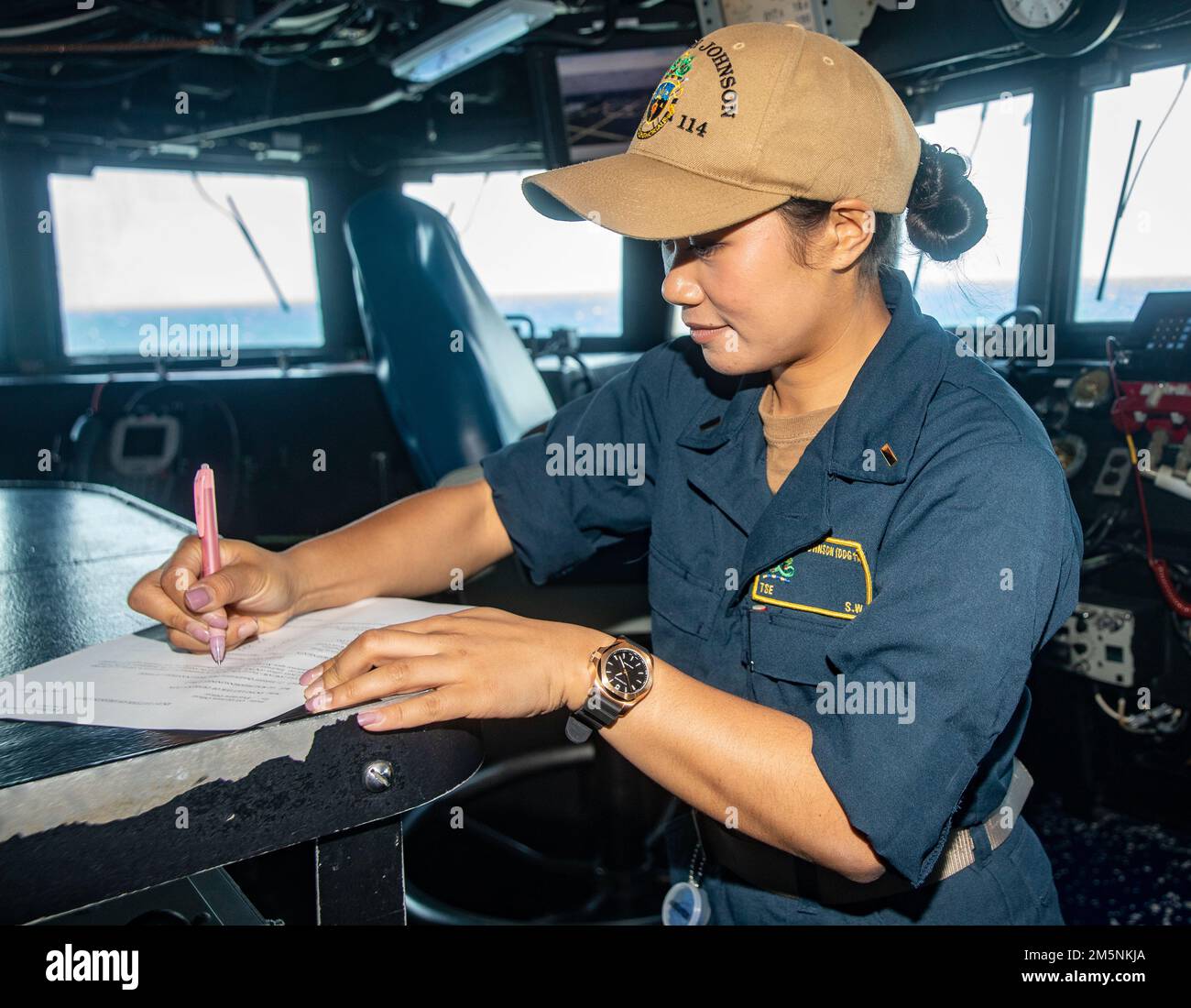SOUTH CHINA SEA (Feb. 25, 2022) Ensign Sydney Tse, from Bayonne, N.J ...