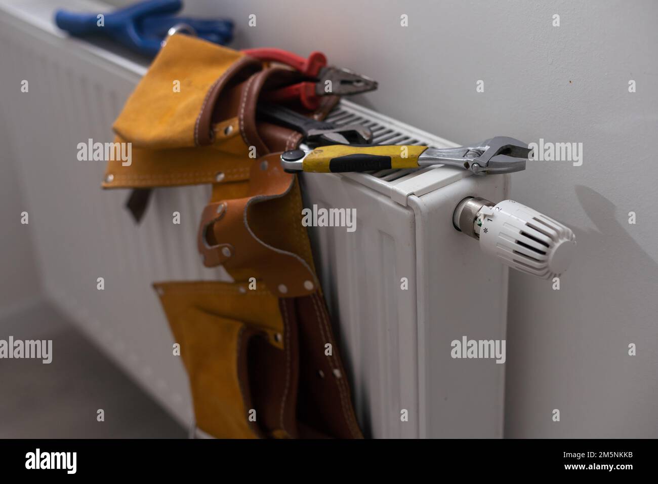 tools on the radiator close up Stock Photo - Alamy