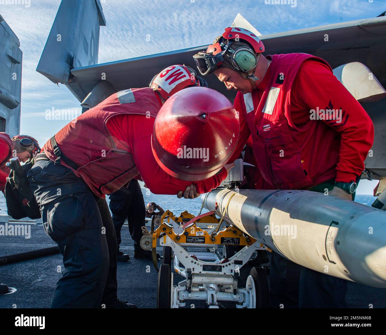 220225-N-MW880-1289 ATLANTIC OCEAN (Feb. 25, 2022) Aviation Ordnancemen ...