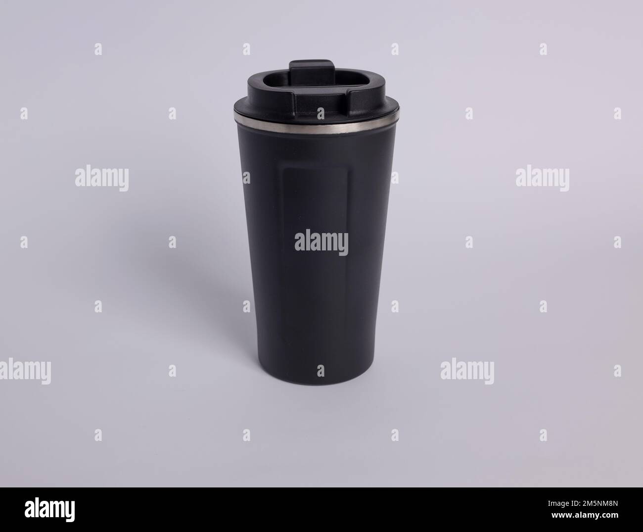 black metal travel mug close up image. Isolated white background ...