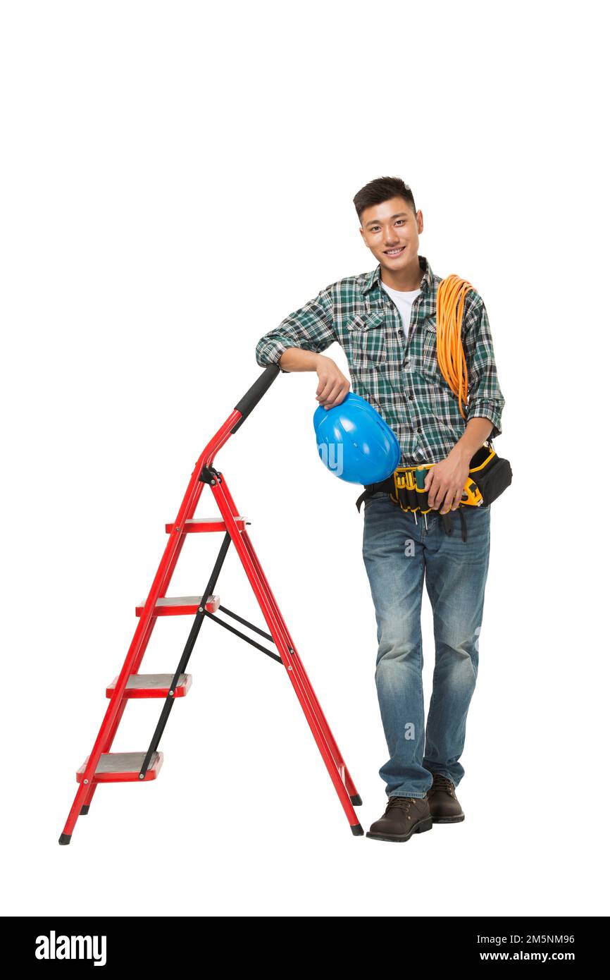 Young construction workers Stock Photo - Alamy