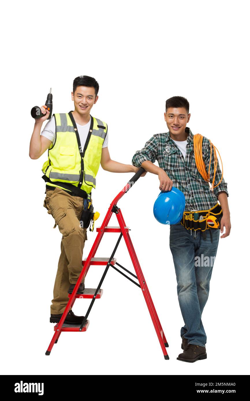 Young construction workers Stock Photo - Alamy