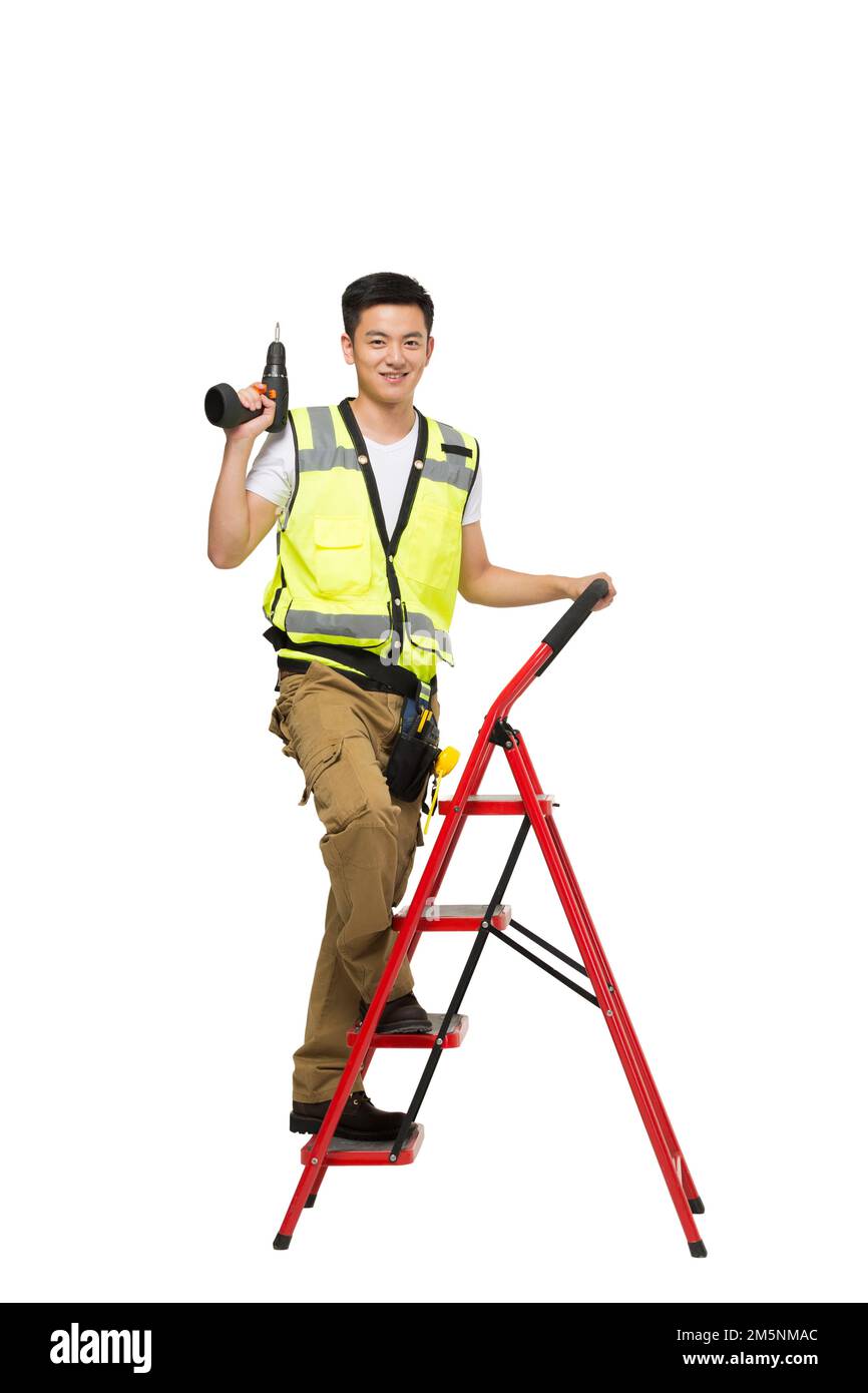 Young construction workers Stock Photo - Alamy