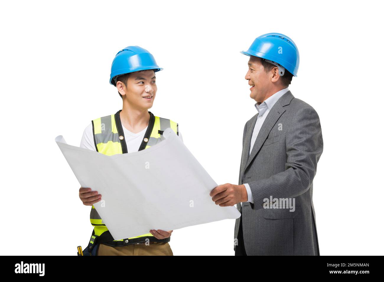 Middle-aged male construction engineers and construction personnel to ...