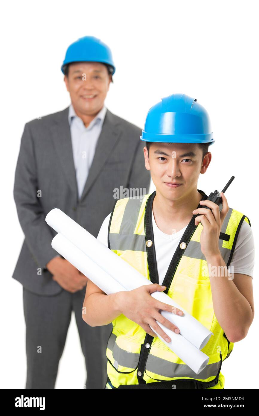 Middle-aged male construction engineers and construction personnel ...