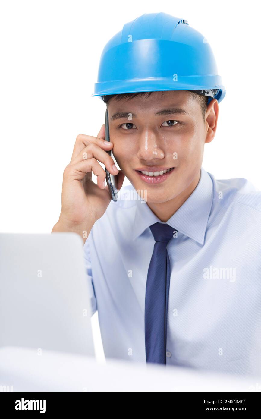 Young construction engineer drawings Stock Photo - Alamy