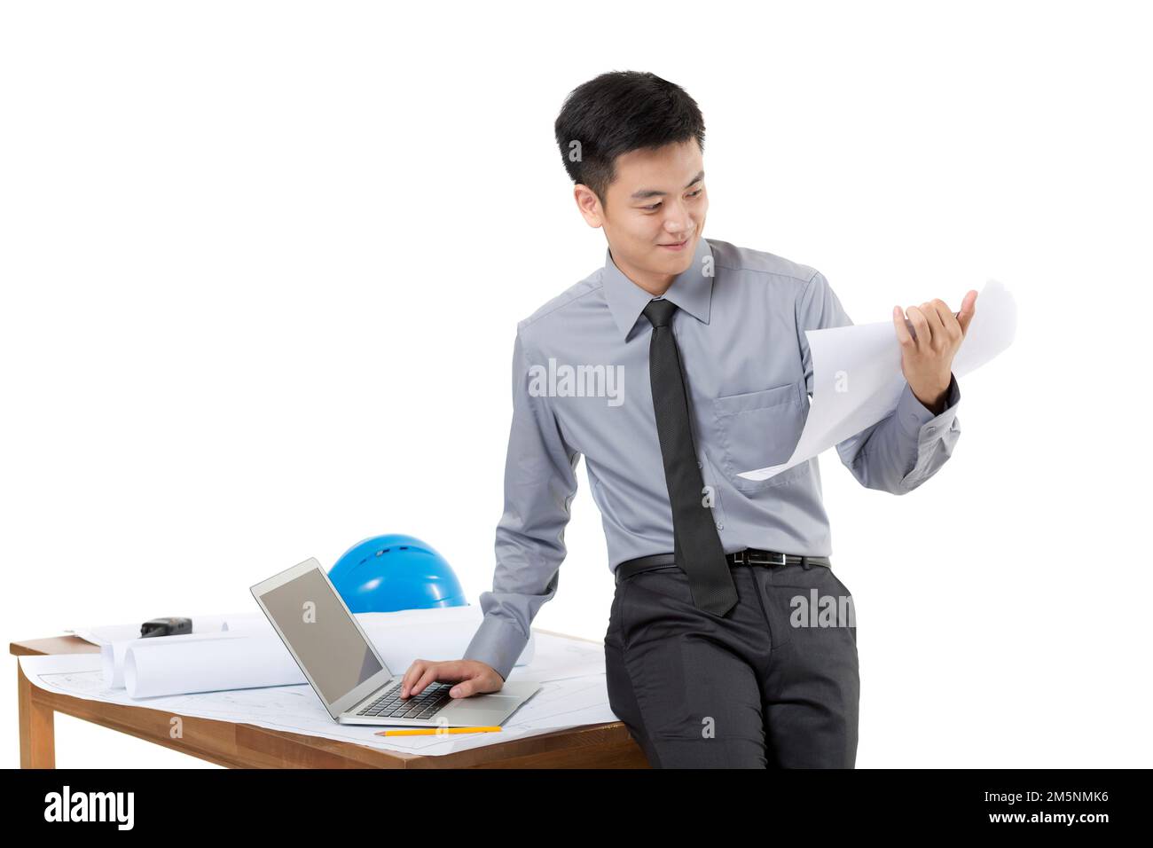 Young construction engineer drawings Stock Photo - Alamy