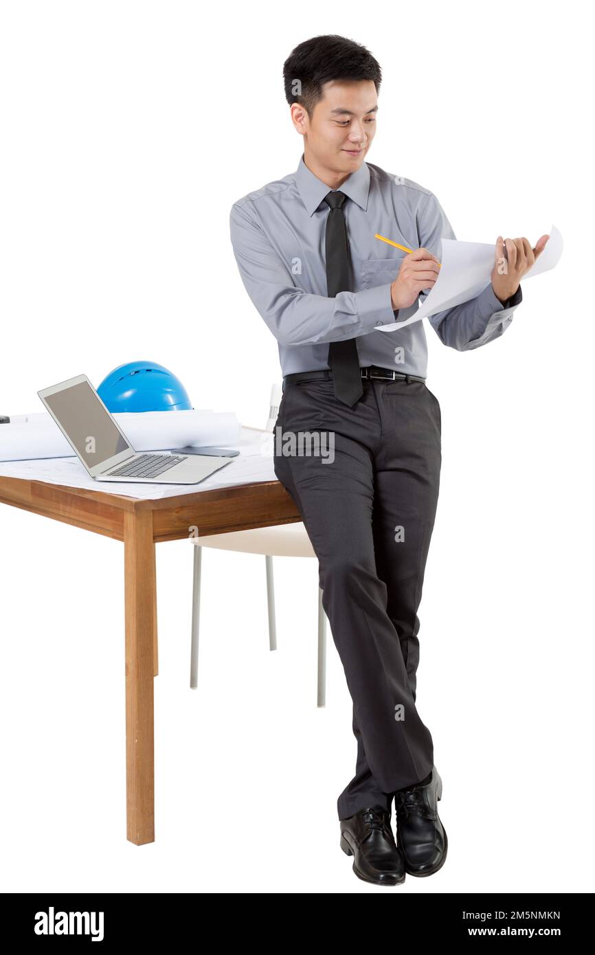 Young construction engineer drawings Stock Photo - Alamy