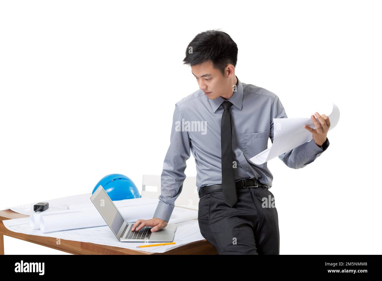 Young construction engineer drawings Stock Photo - Alamy