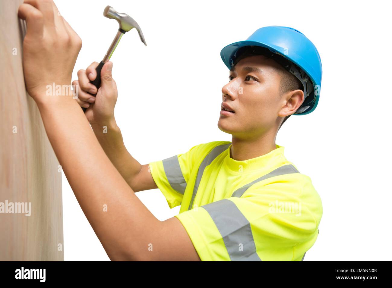 Young male nail construction workers Stock Photo - Alamy