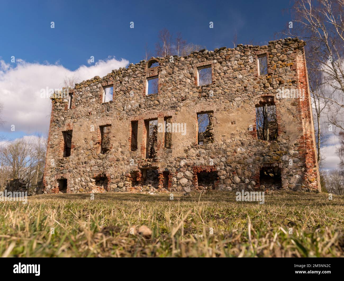 wonderful landscape with ruins of an old manor house, trees in the old ...