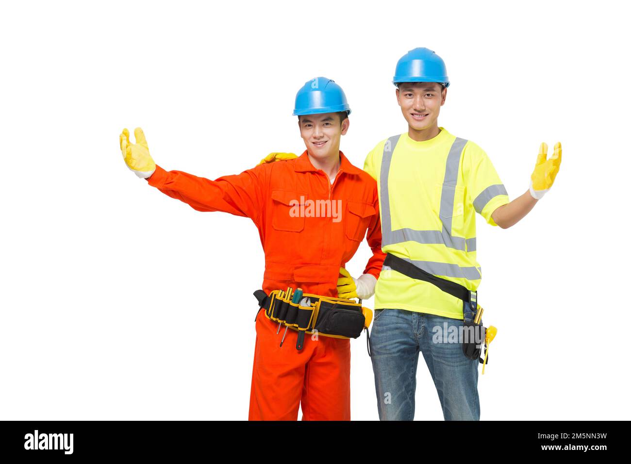 Two young men construction workers Stock Photo - Alamy