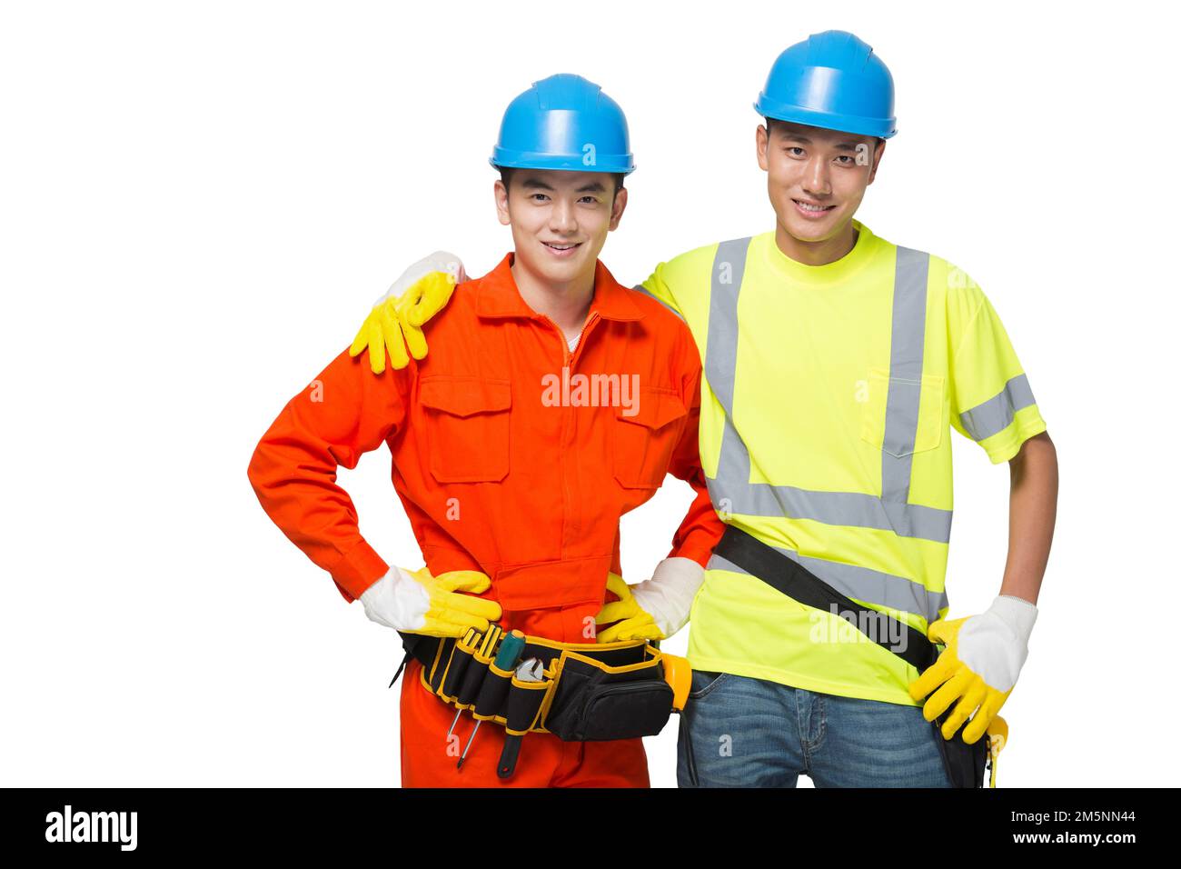Two young men construction workers Stock Photo - Alamy