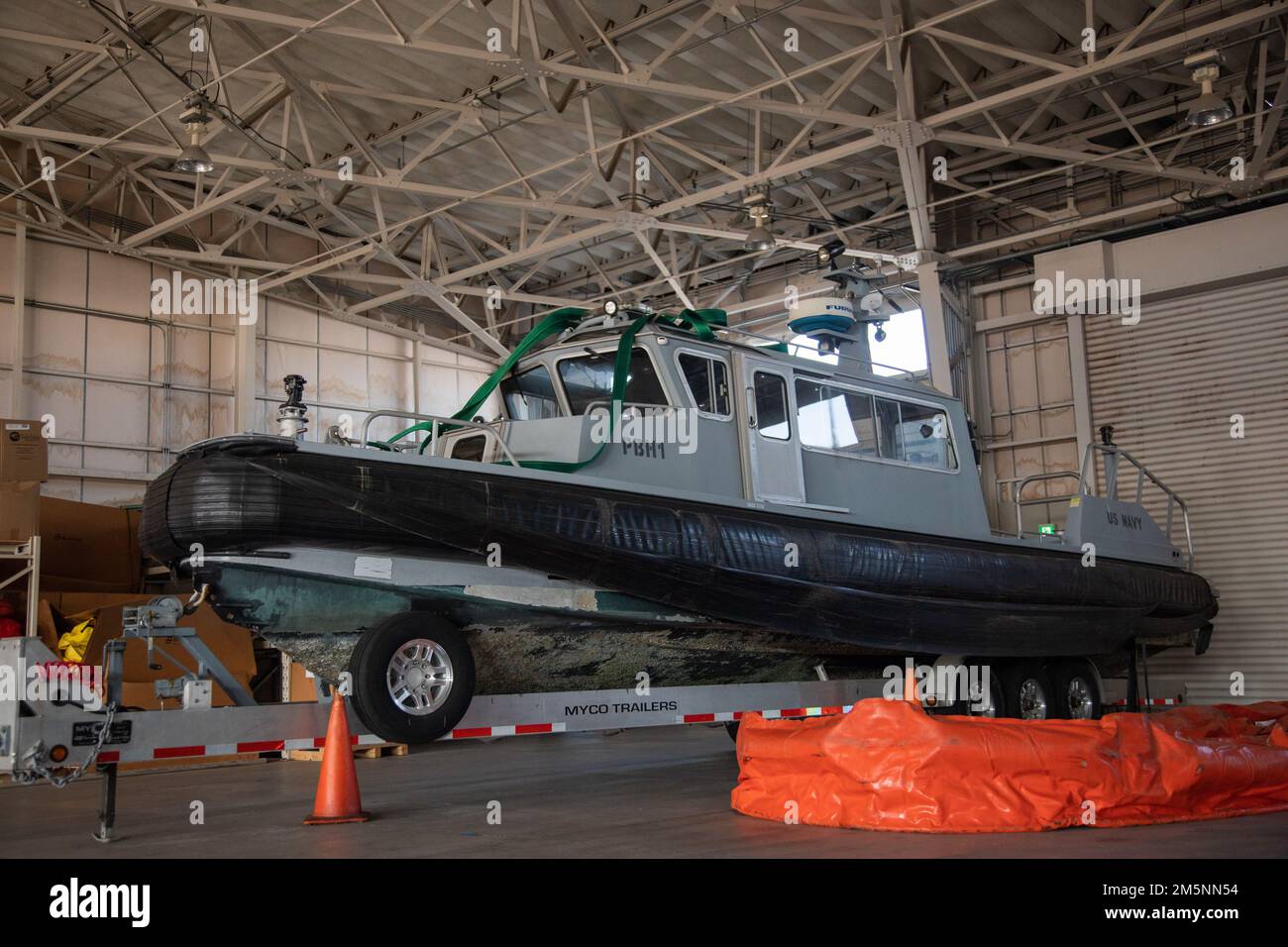 A security boat is stored in a warehouse at Marine Corps Air Station ...