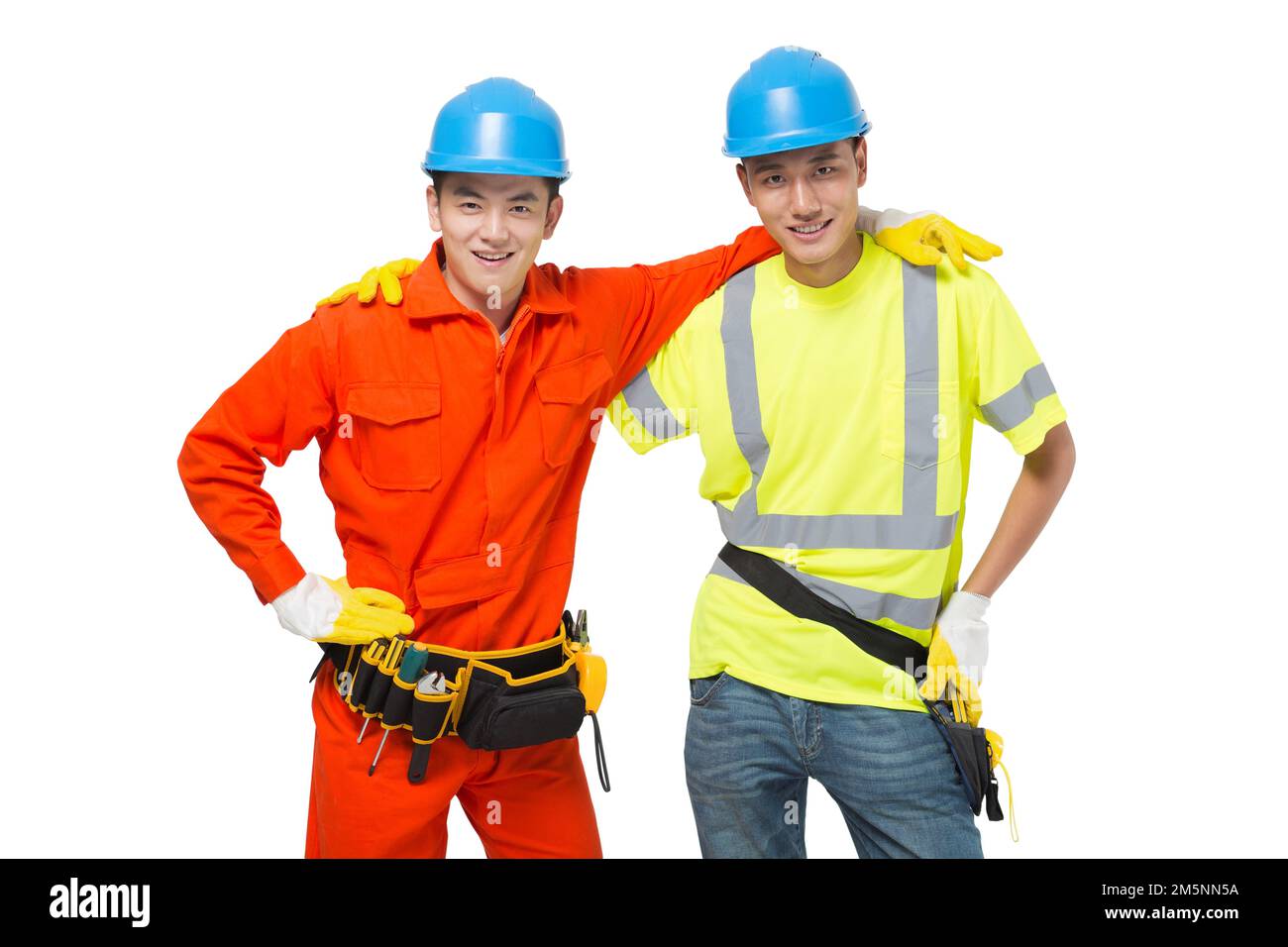 Two young men construction workers Stock Photo - Alamy