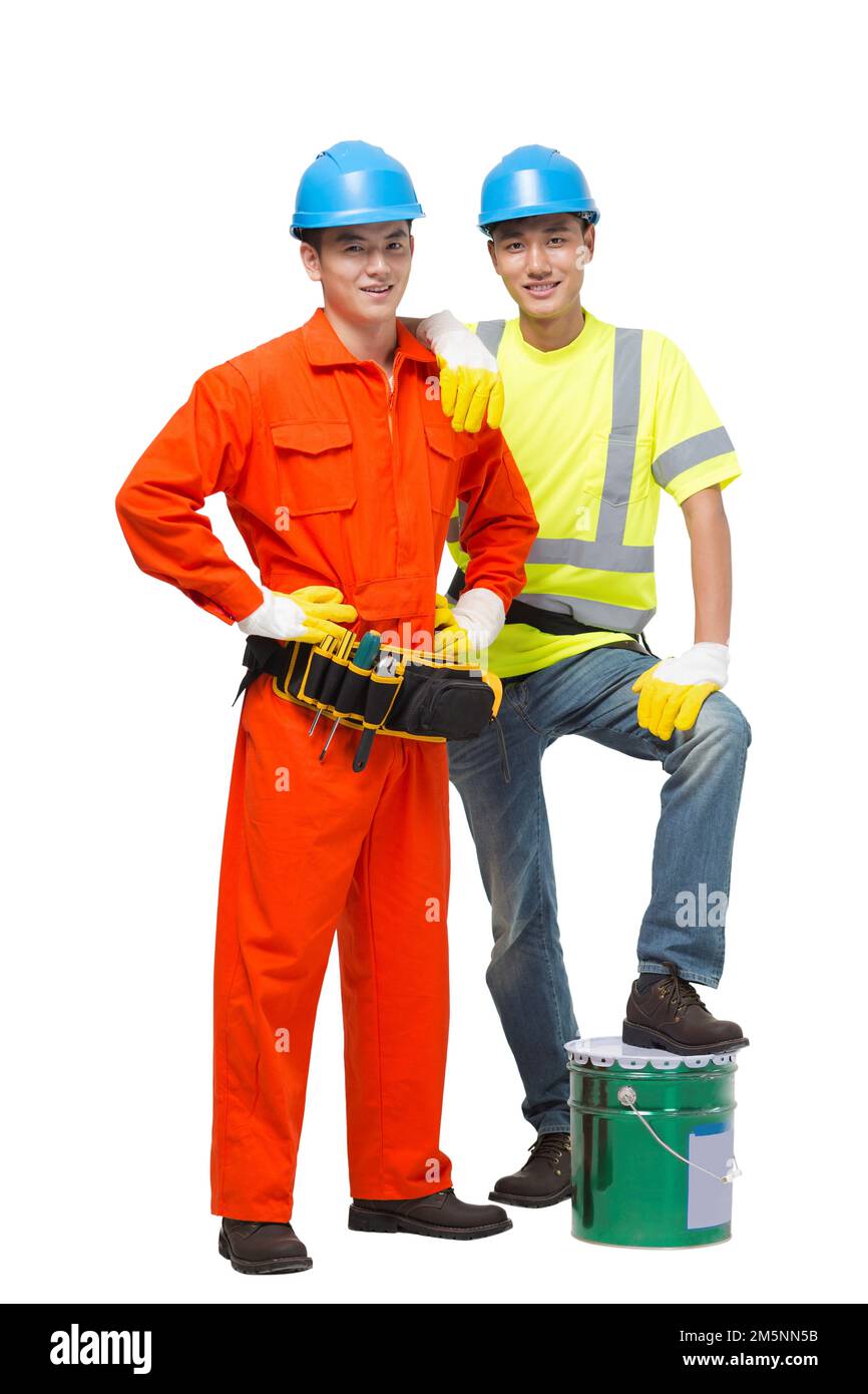 Two young men construction workers Stock Photo - Alamy