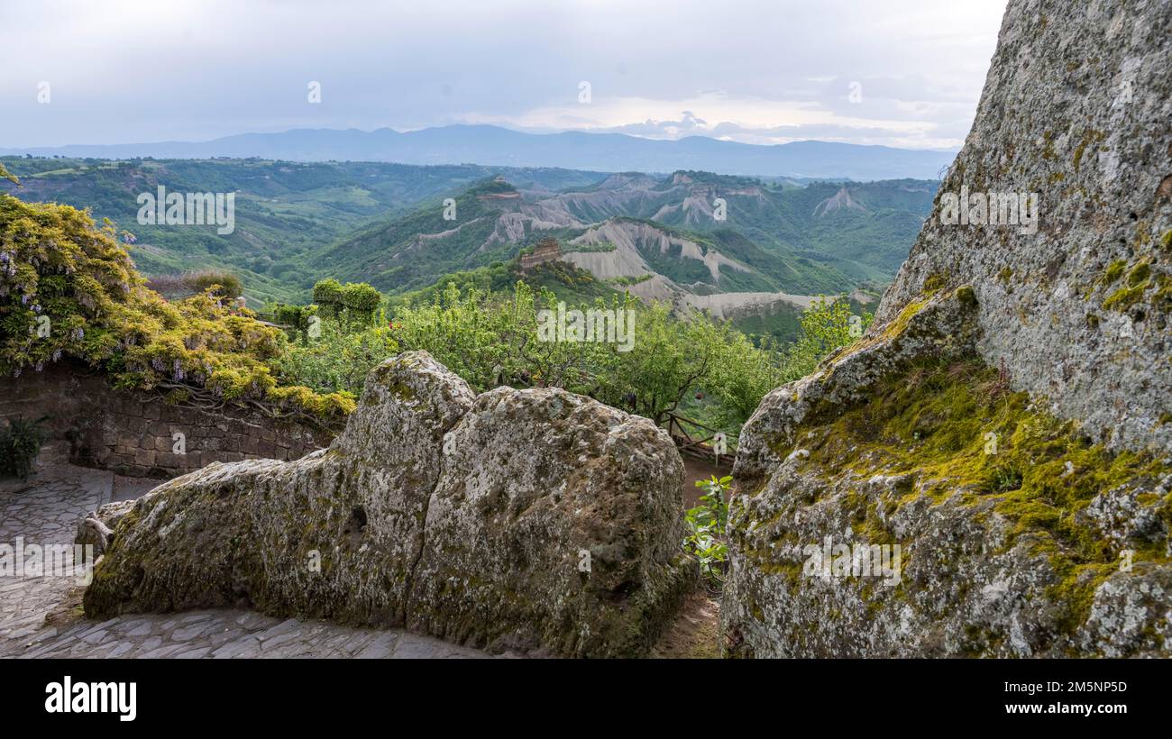 View from Civita di Bagnoregio on hilly landscape Valle dei Calanchi ...