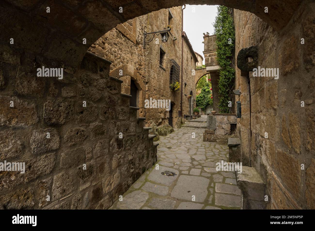 Ancient tufa buildings in the hilltop village of Civita di Bagnoregio ...