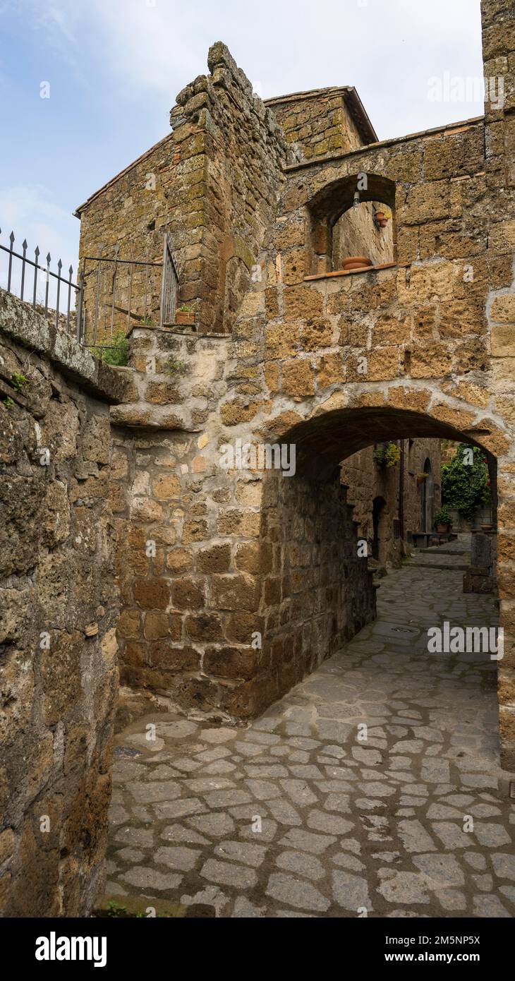 Ancient tufa buildings in the hilltop village of Civita di Bagnoregio ...