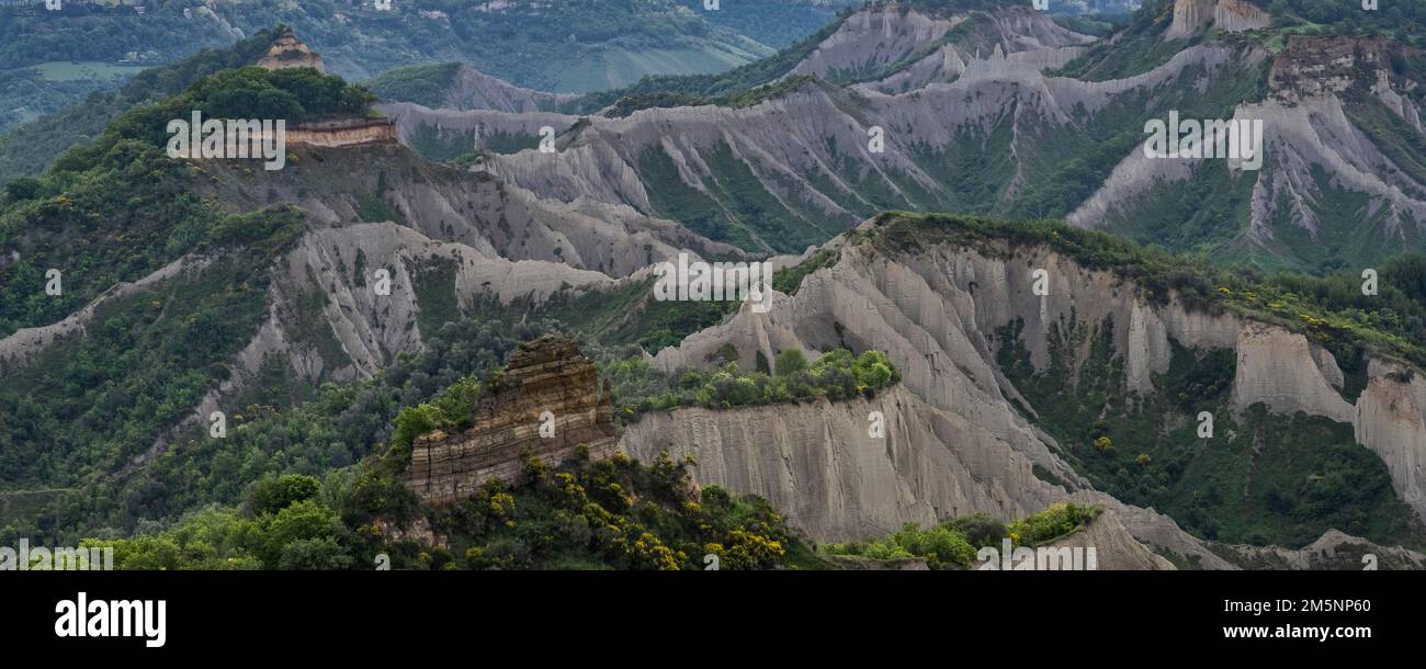 View from Civita di Bagnoregio on hilly landscape Valle dei Calanchi ...