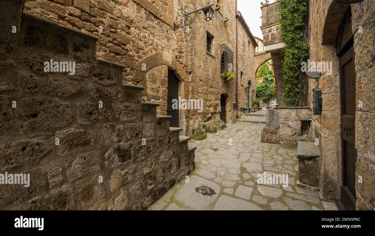 Ancient tufa buildings in the hilltop village of Civita di Bagnoregio ...