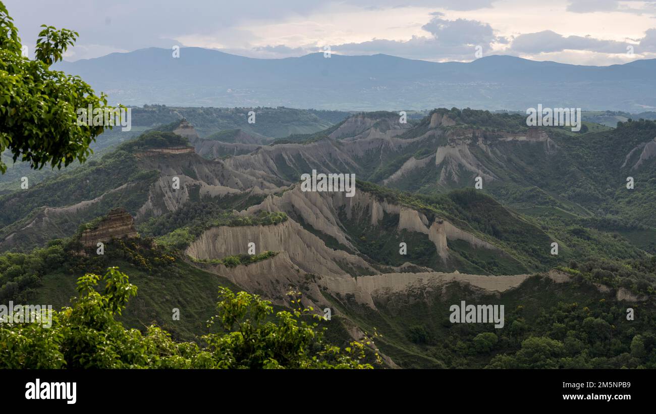 View from Civita di Bagnoregio on hilly landscape Valle dei Calanchi ...