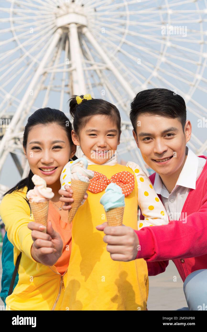 My happy to play in the amusement park Stock Photo - Alamy