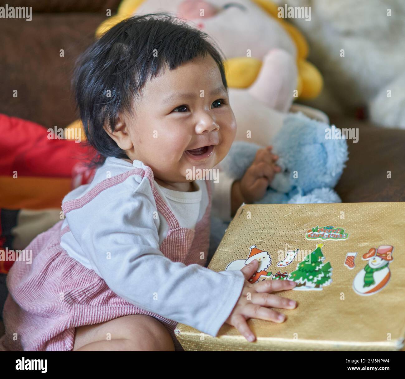 Toddler celebrates christmas hi-res stock photography and images - Alamy