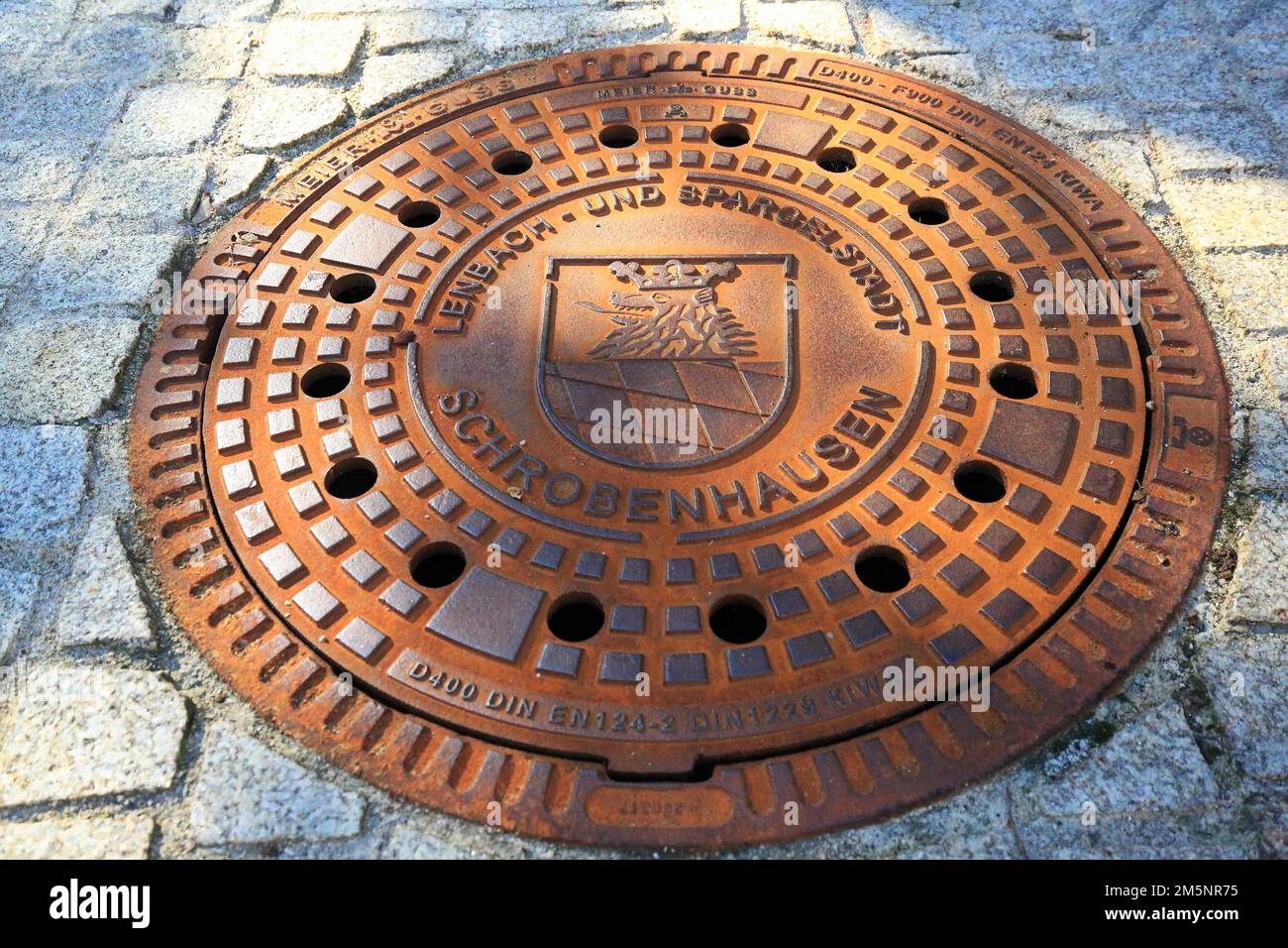 Manhole cover with coat of arms of Schrobenhausen. Schrobenhausen ...