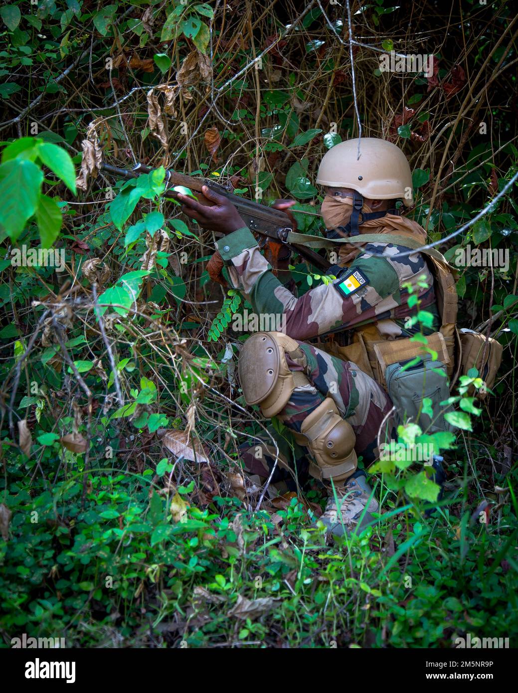 Niger Special Forces Soldier pulls security and maintains situational ...