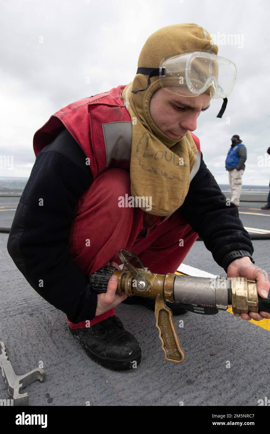 Damage Controlman 2nd Class Ethan Louden, from Tampa, Florida, assigned ...