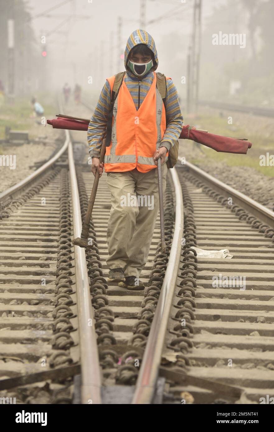 Guwahati, Guwahati, India. 30th Dec, 2022. An Indian Railway employee ...