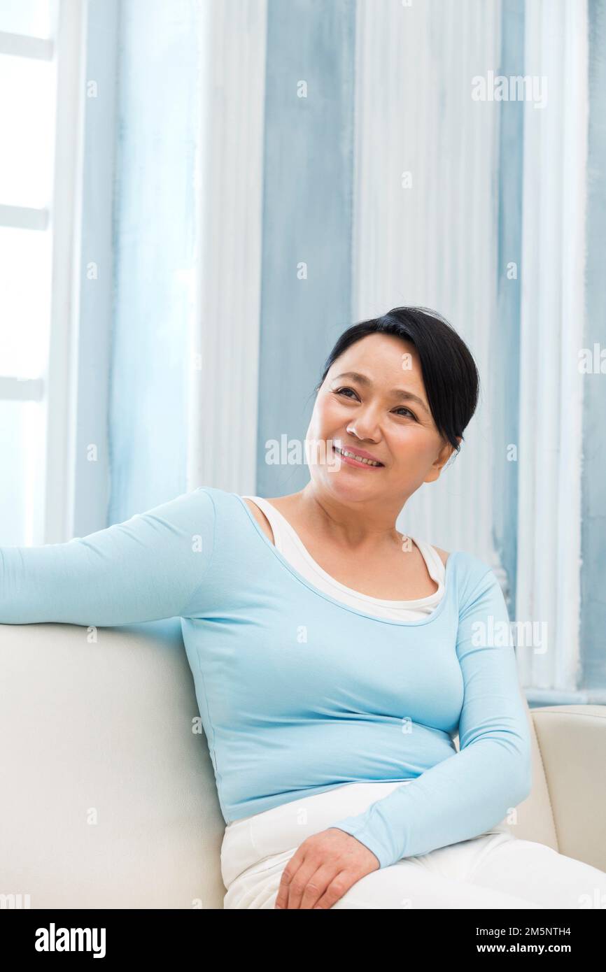 Arm draped over the back of a chair hi-res stock photography and images ...