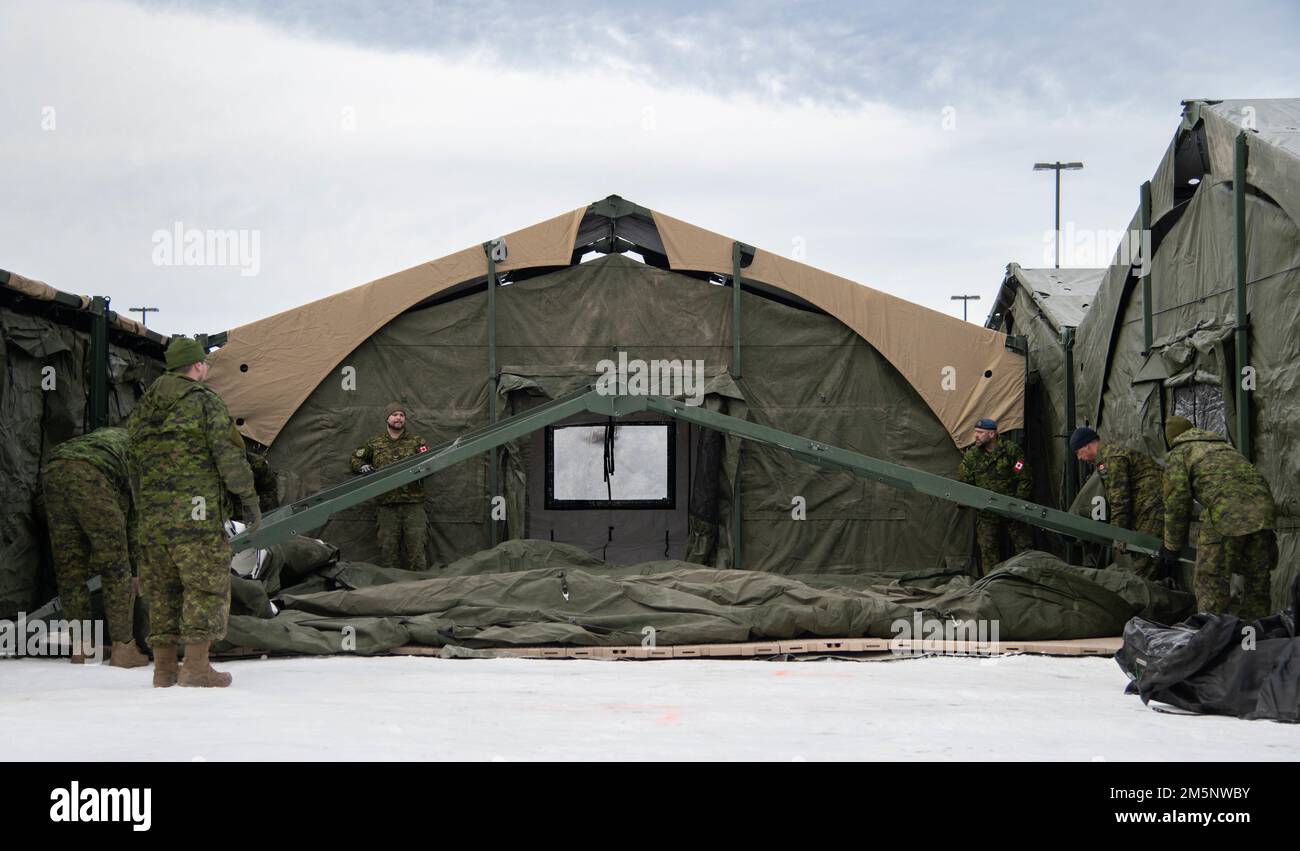 An advance party of Canadian Armed Forces members set up a Headquarters ...