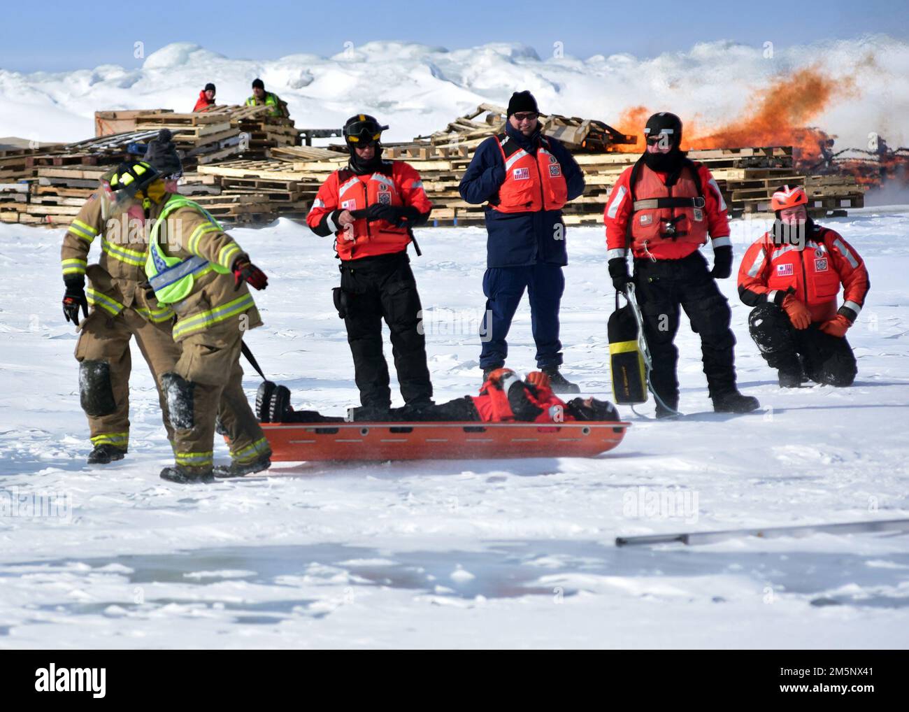 Firefighters evacuate Capt. Anthony R. Jones, Sector Commander of Coast ...