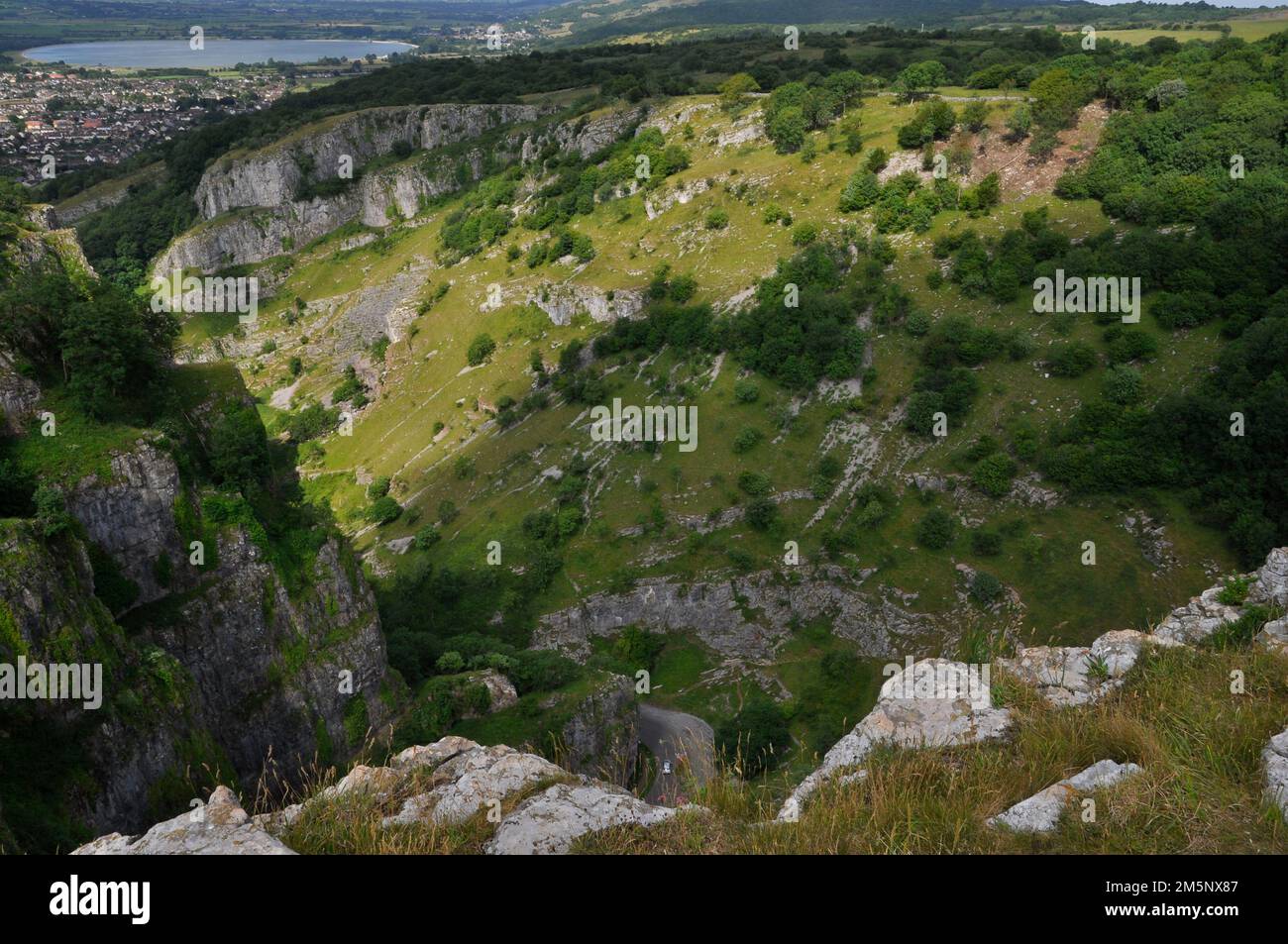 A view from the top of the Cheddar Gorge towards Cheddar reservoir and ...