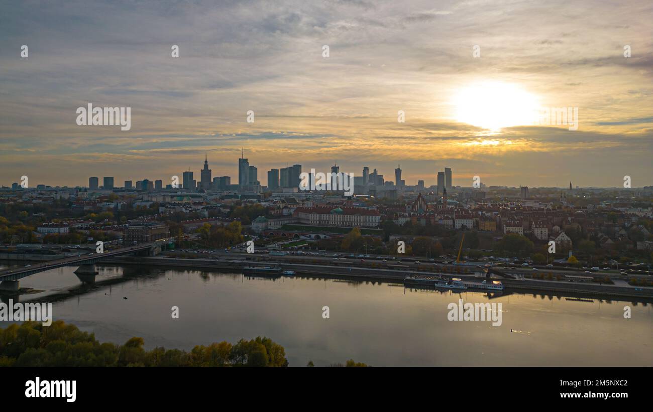 Warsaw at sunset. The capital of Poland is illuminated by a beautiful ...