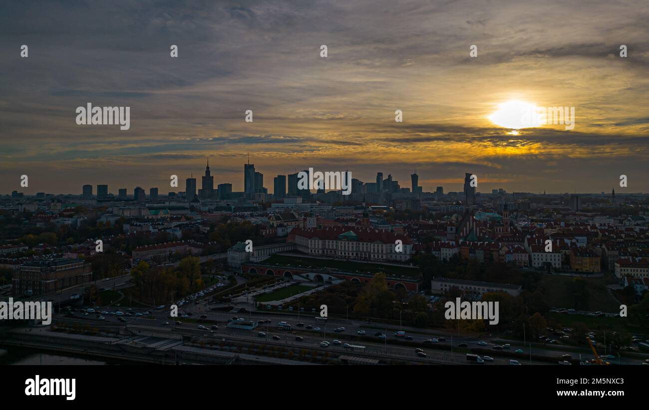 Warsaw at sunset. The capital of Poland is illuminated by a beautiful ...