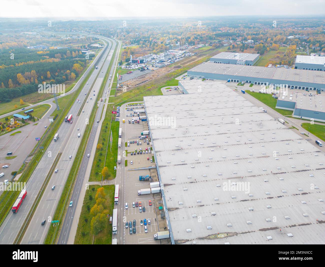 Aerial view of a logistics park with warehouse, loading hub and many ...