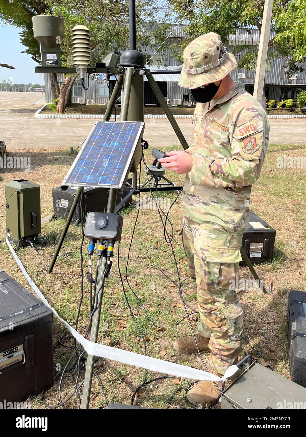 Air Force Staff Sgt. Trenton Kipe, a staff weather officer assigned to ...
