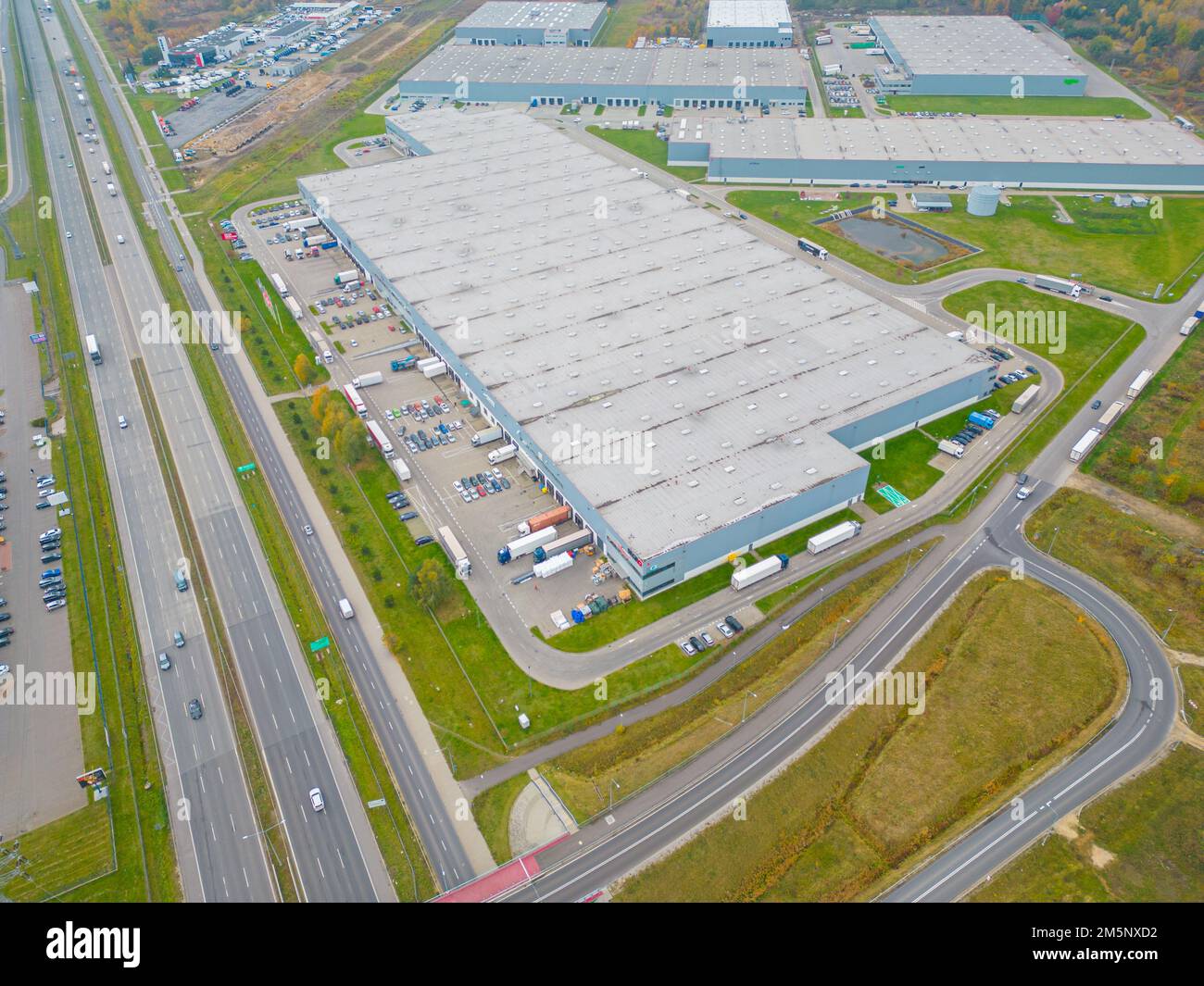 Aerial view of a logistics park with warehouse, loading hub and many ...