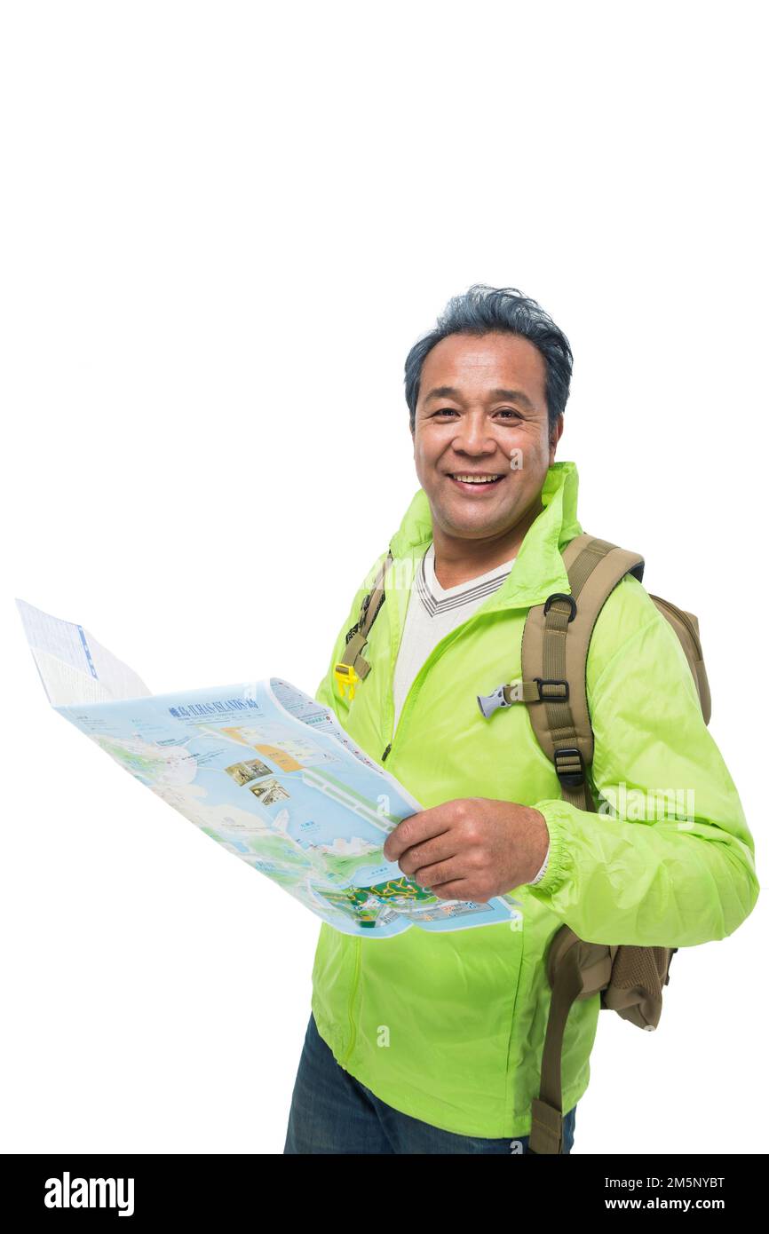 Happy with a map in the elderly Stock Photo - Alamy