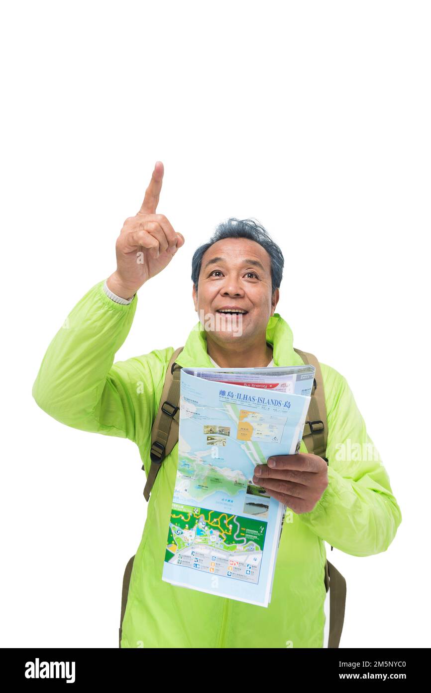 Happy in old people holding a map to the distance Stock Photo - Alamy