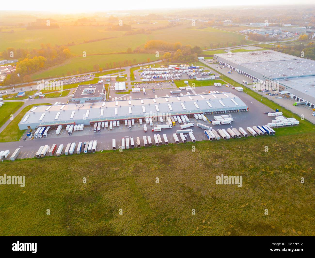 Aerial view of the logistics park with warehouse, loading hub and many ...